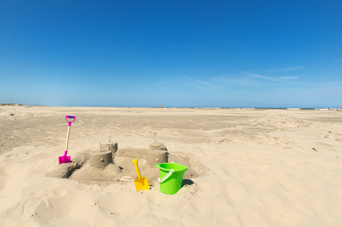 Sand Castle With Toys At The Beach Wall Mural