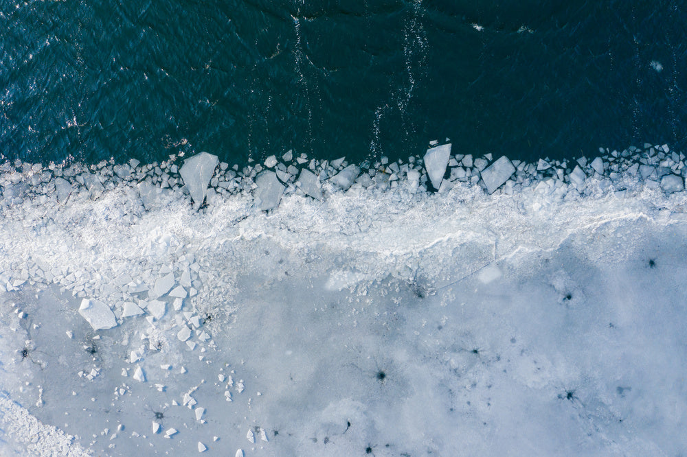 Glacier Lagoon With Icebergs From Above Aerial View Cracked Ice From D